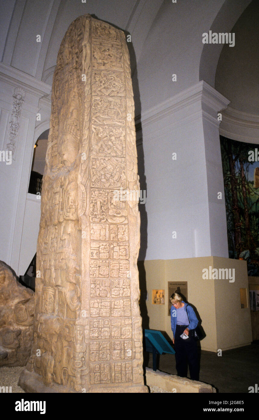 Carved inscriptions on a large stone obelisk left over from the Mayan ...