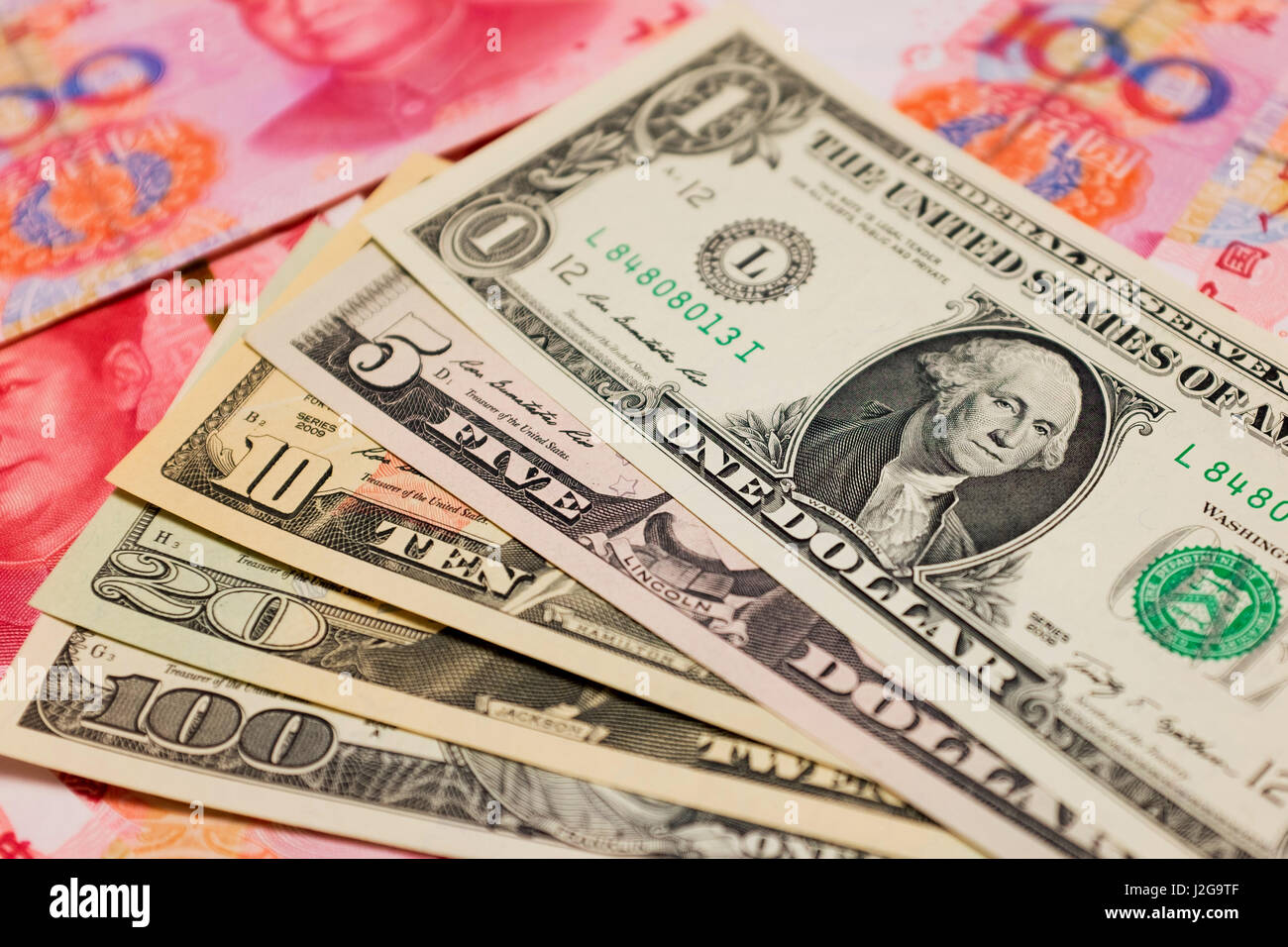 Chinese Yuan Note and U.S. dollar background (Exchange rate concept ...