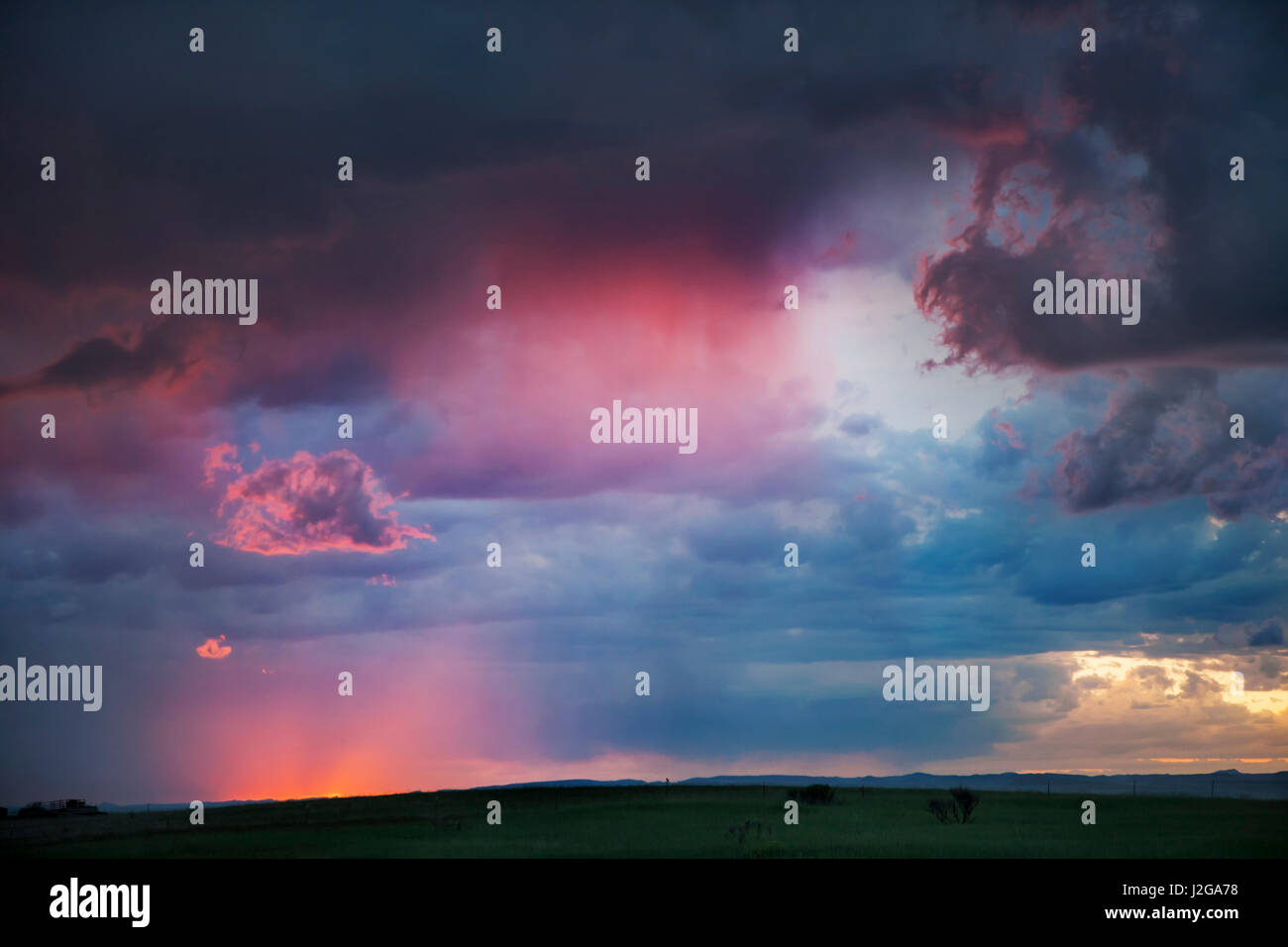 USA, Colorado, Front Range. Sunset thunderstorm on plains. Credit as ...