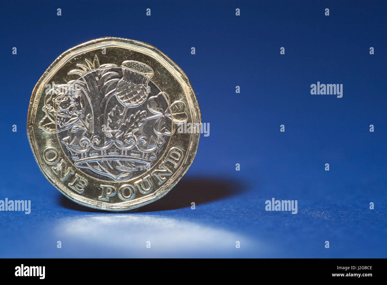 New pound coin 2012, 12 sided Stock Photo - Alamy