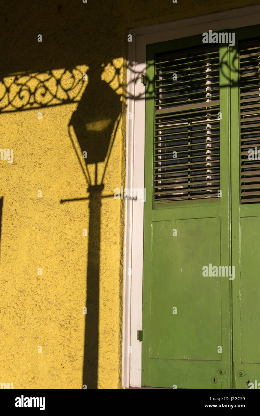 US, LA, New Orleans French Quarter. Early light creates shadow patterns ...