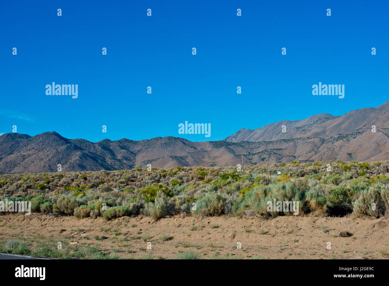 USA, Nevada, Black Rock Desert, Granite Mountain Range along Highway 34 ...