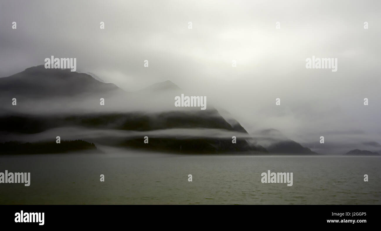 A foggy mist layers the mountains of Resurrection bay in Alaska Stock ...