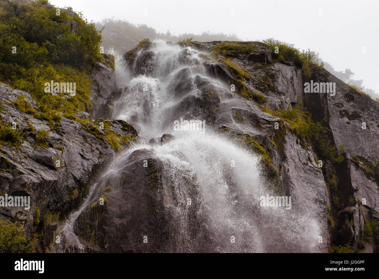 Wild water rushing down the rocks into Resurrection Bay, Alaska (Large ...