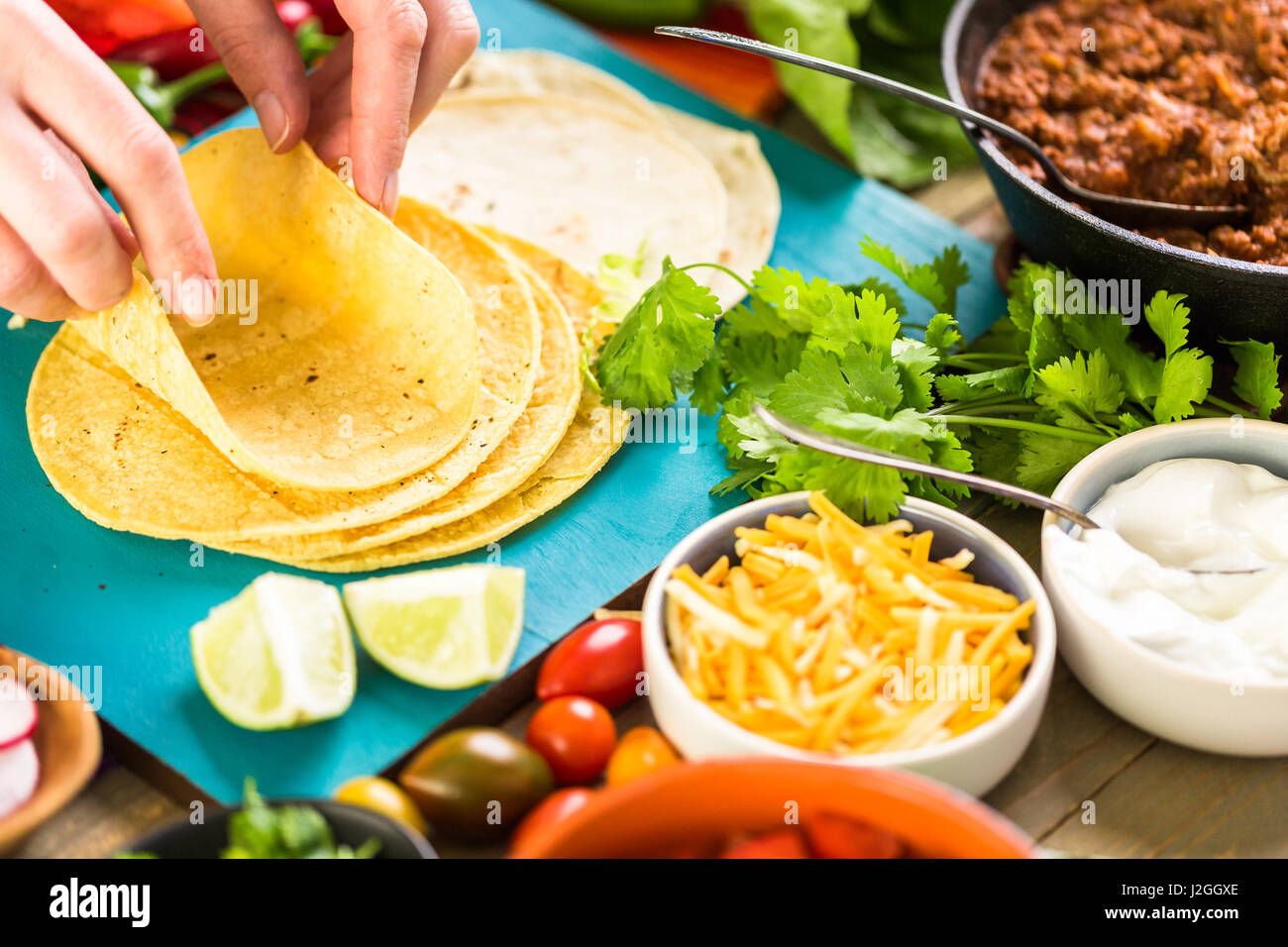 Step by step. Ground beef tacos with romaine lettuce, diced tomatoes ...