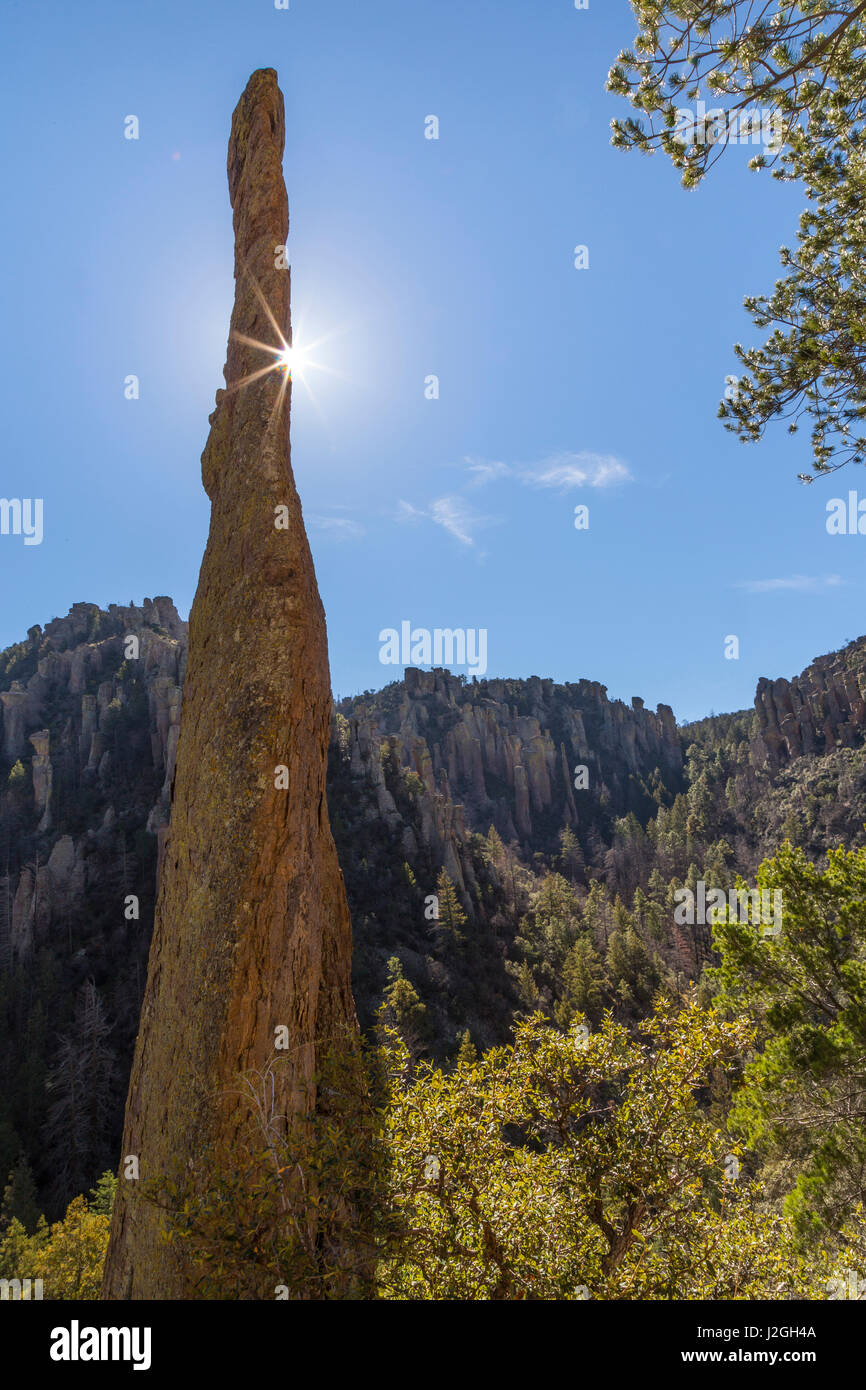 USA, Arizona, Chiricahua National Monument. Sunburst on rocky spire ...
