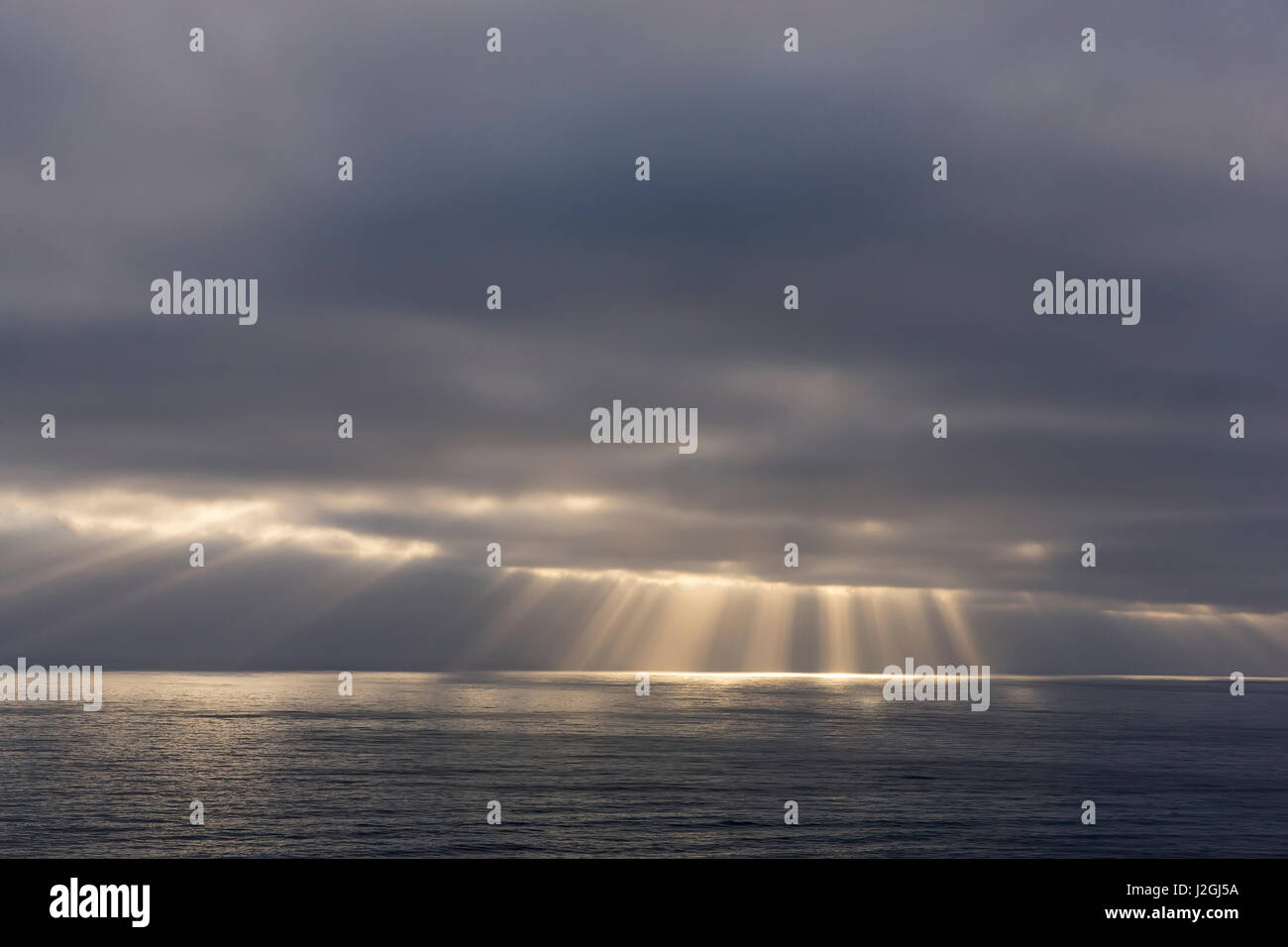 Rays emit from the clouds over the Pacific Ocean near Santa Cruz ...