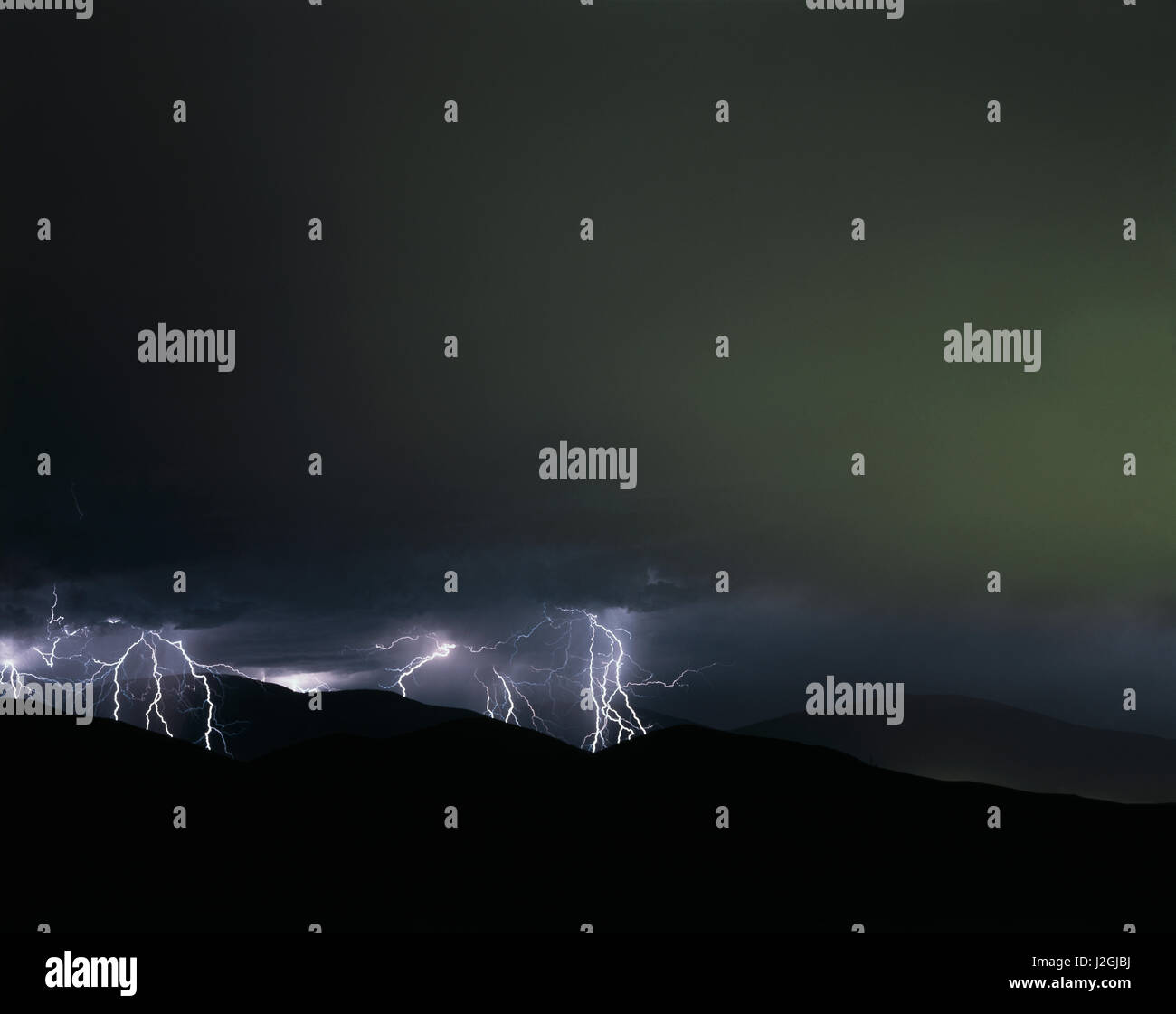 USA, California, Lightning strikes over the mountains. (Large format ...