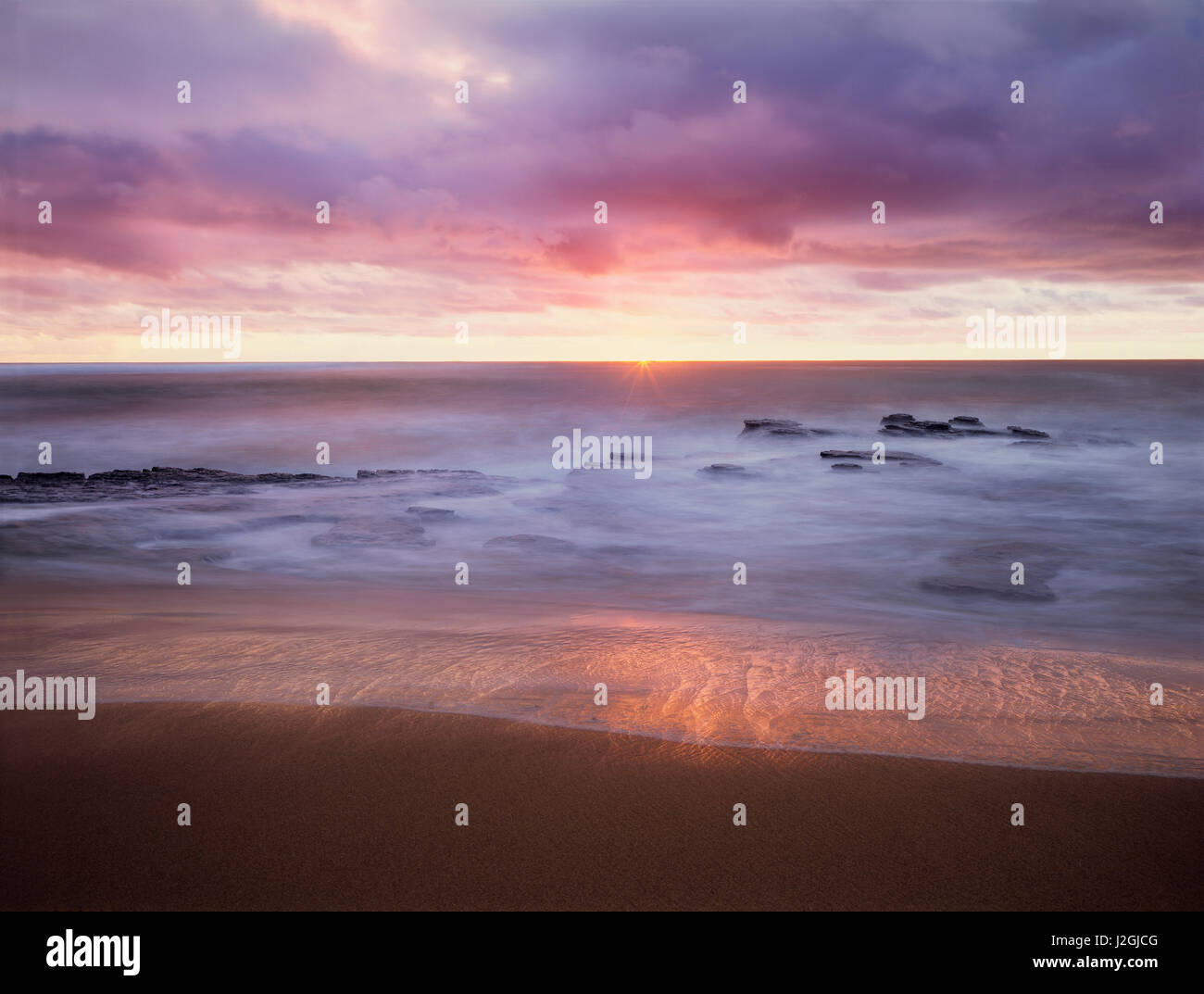 USA, California, San Diego, Sunset over tide pools on the Pacific Ocean ...