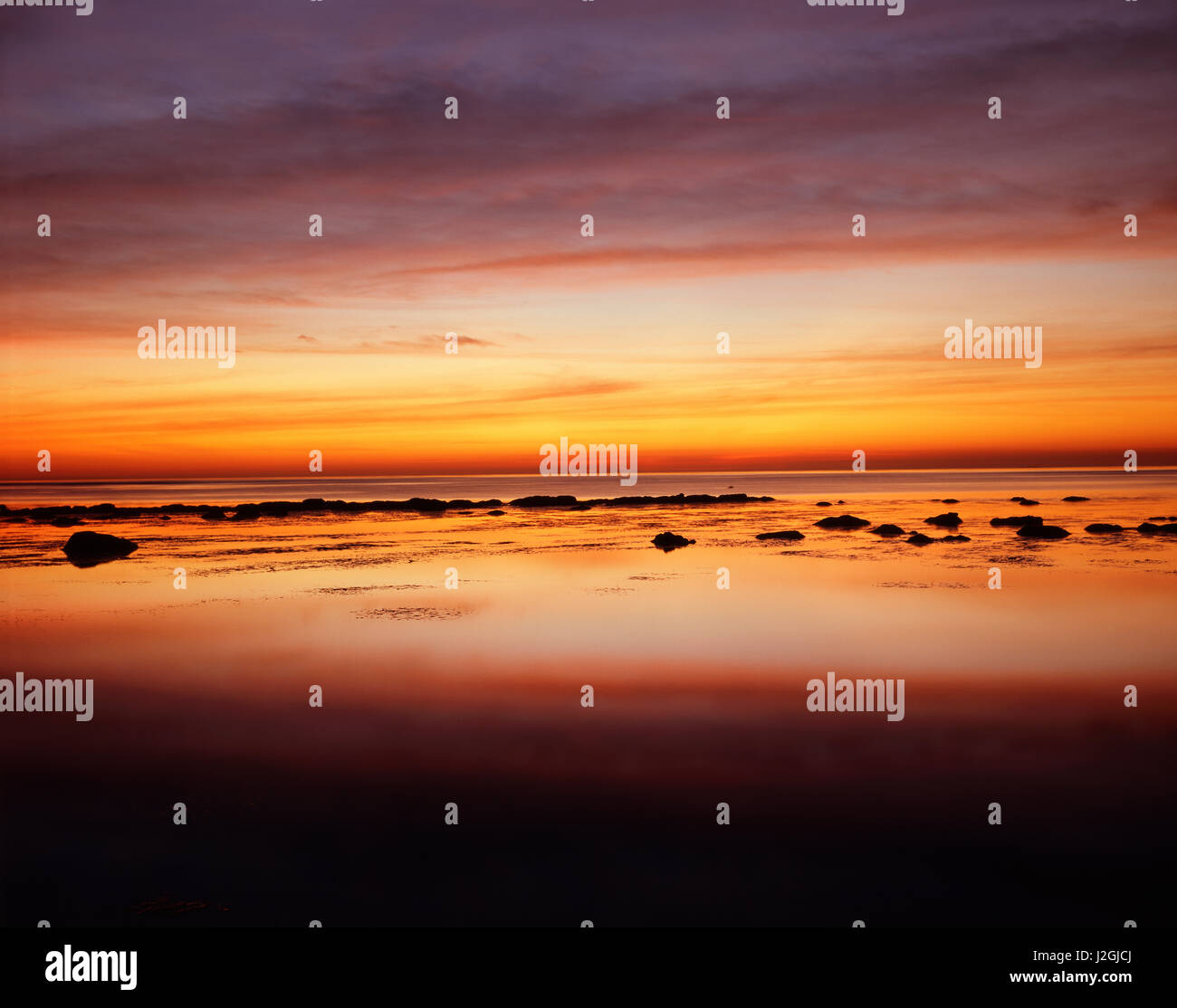 USA, California, San Diego, Sunset over tide pools on the Pacific Ocean ...