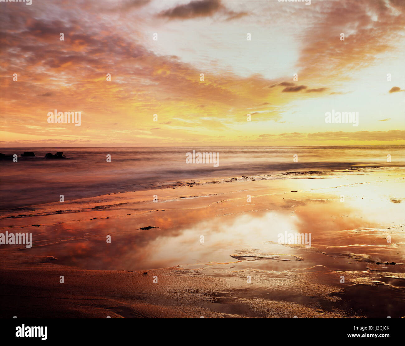 USA, California, San Diego, Sunset over tide pools on the Pacific Ocean ...