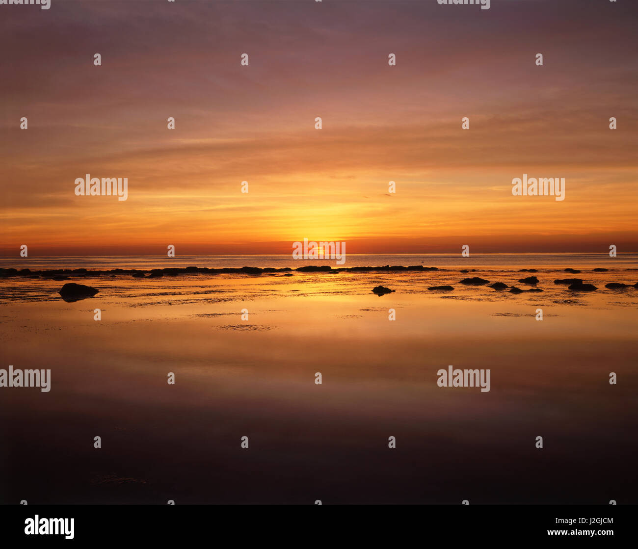 USA, California, San Diego, Sunset over tide pools on the Pacific Ocean ...