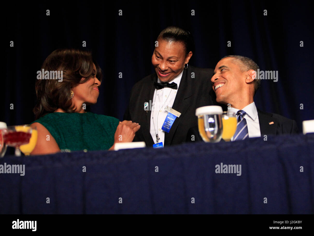 Banquet server Kitty Casey serves First Lady Michelle Obama and ...