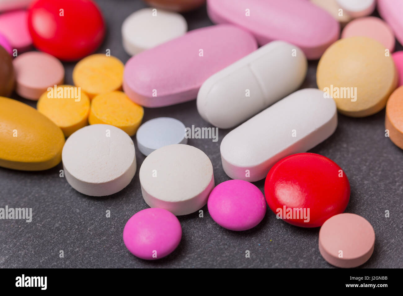 different Tablets pills capsule heap mix therapy drugs Stock Photo - Alamy