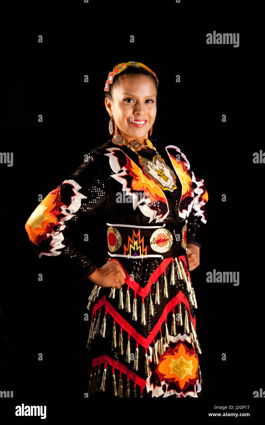 Jingle dancer Elishia Lahr (Navajo) wears a traditional jingle dress ...