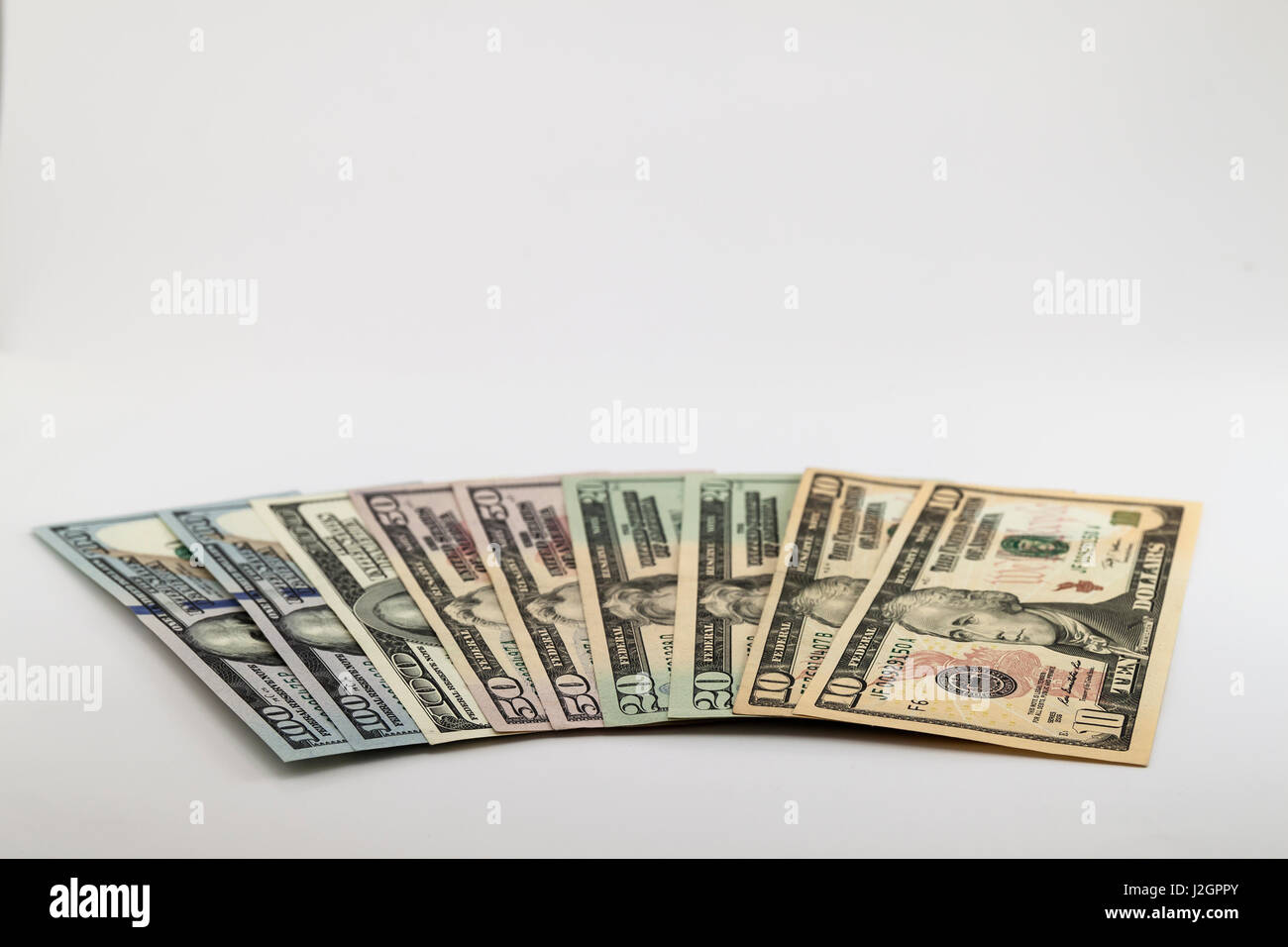 US american dollar money bills spread on white background Stock Photo ...