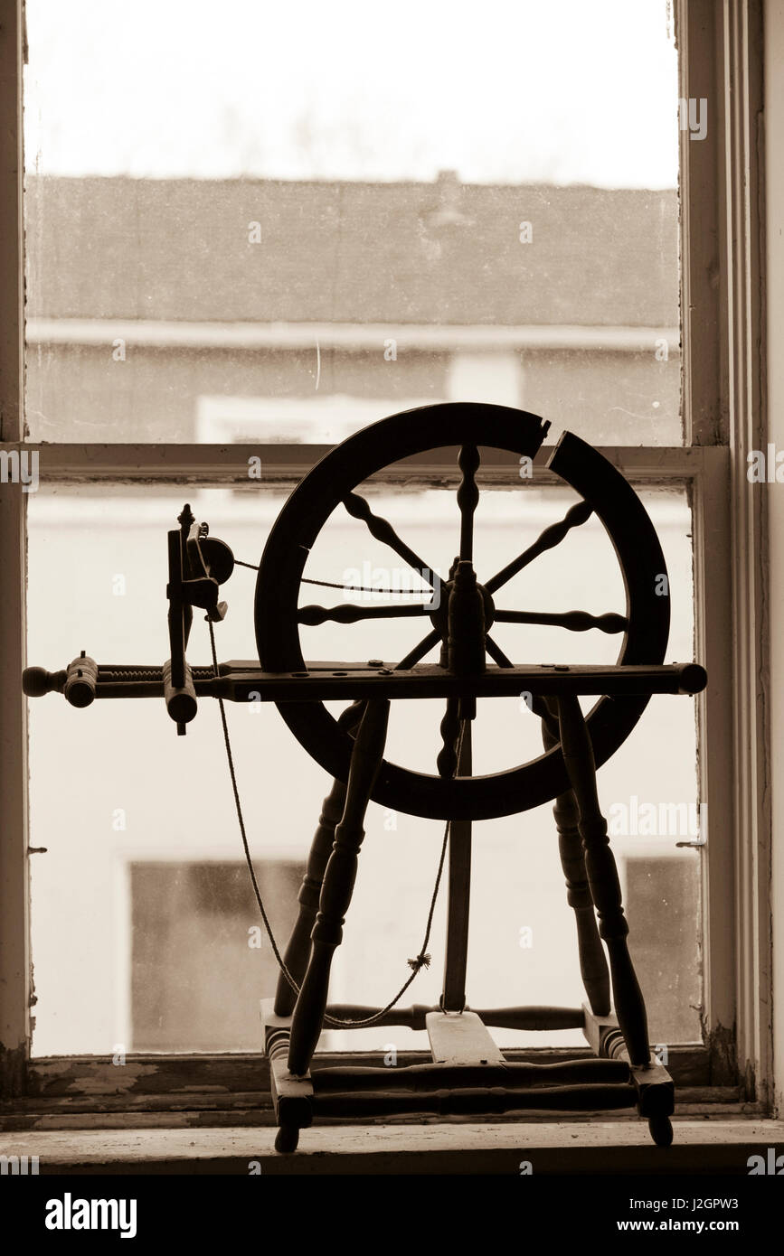 Spinning wheel in a window, Wilmington, Illinois, USA. Route 66 Stock ...