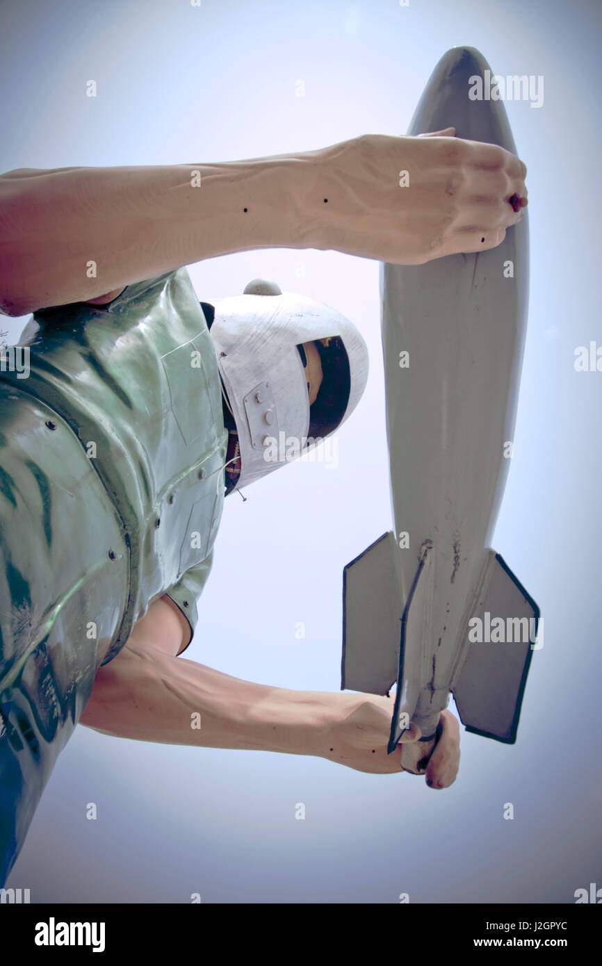 Low angled view of the sculpture Gemini Giant holds a rocket ...