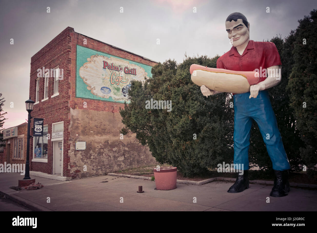 Sculpture of a giant man holding a hot dog, Atlanta, Illinois, USA ...