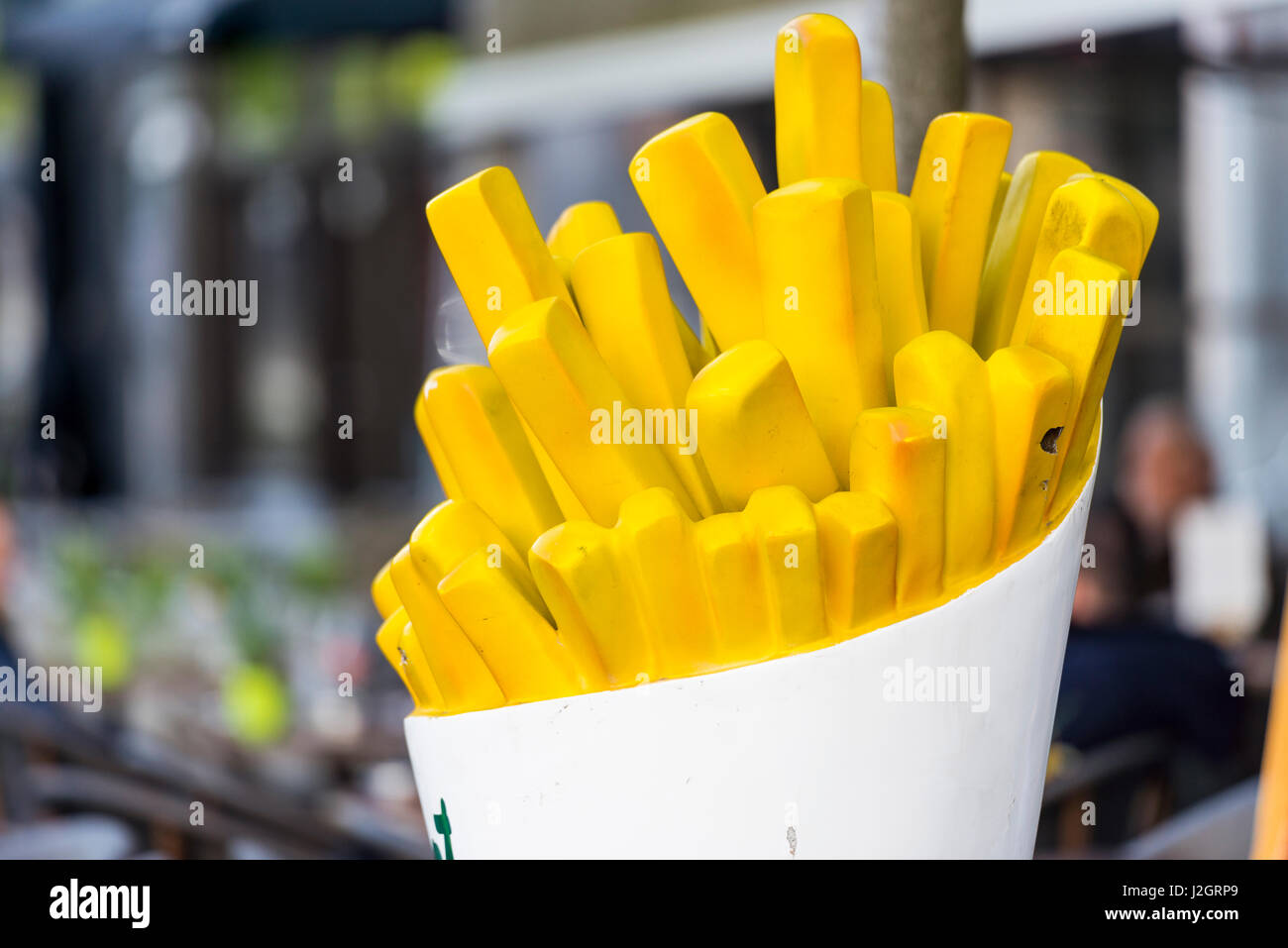 packet of fries at a typical Belgian chips store Stock Photo - Alamy