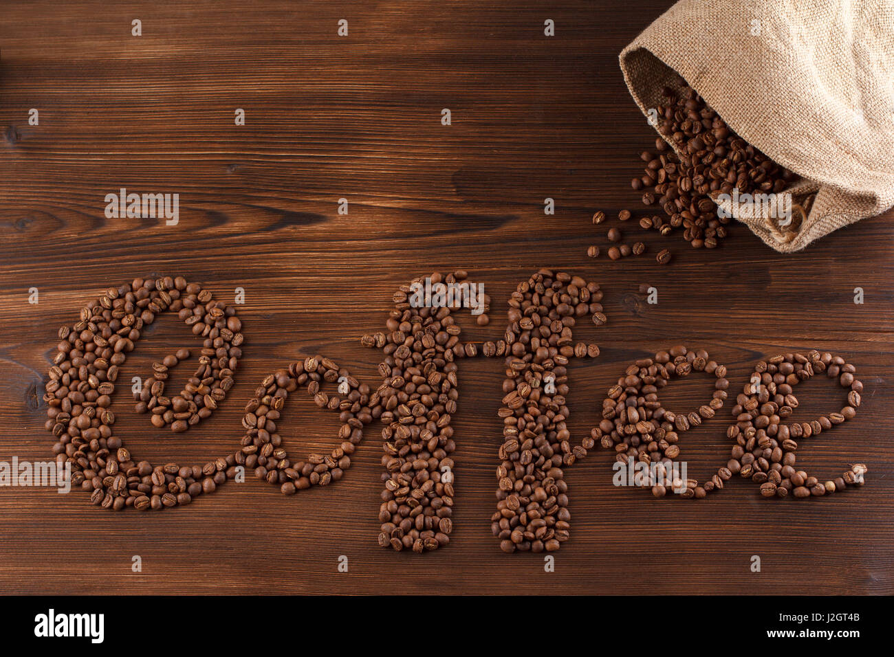 lettering coffee. Coffee beans in the form of a text coffee, wooden ...