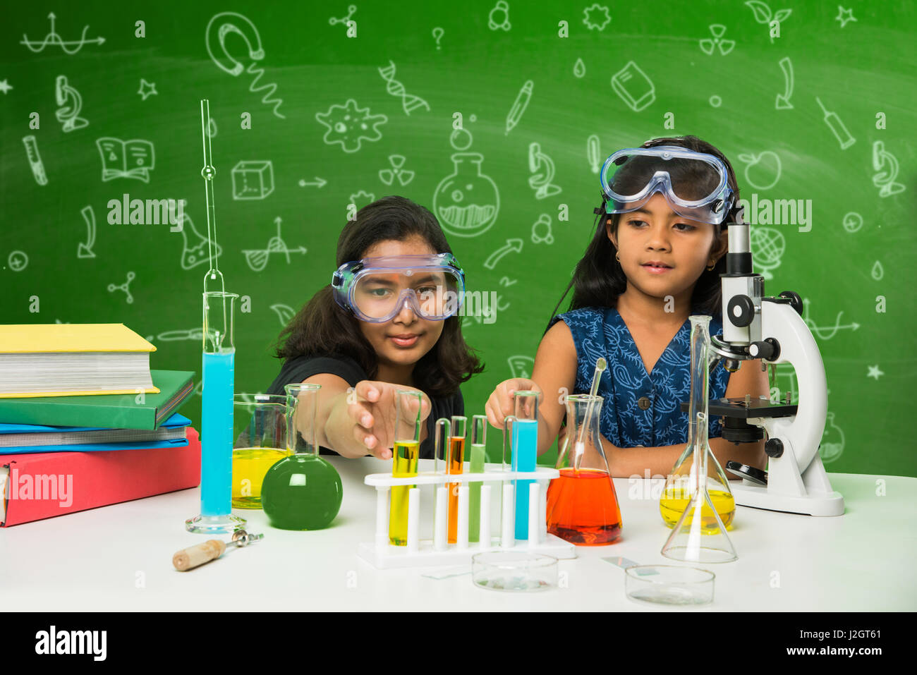 Indian kids doing science hi-res stock photography and images - Alamy