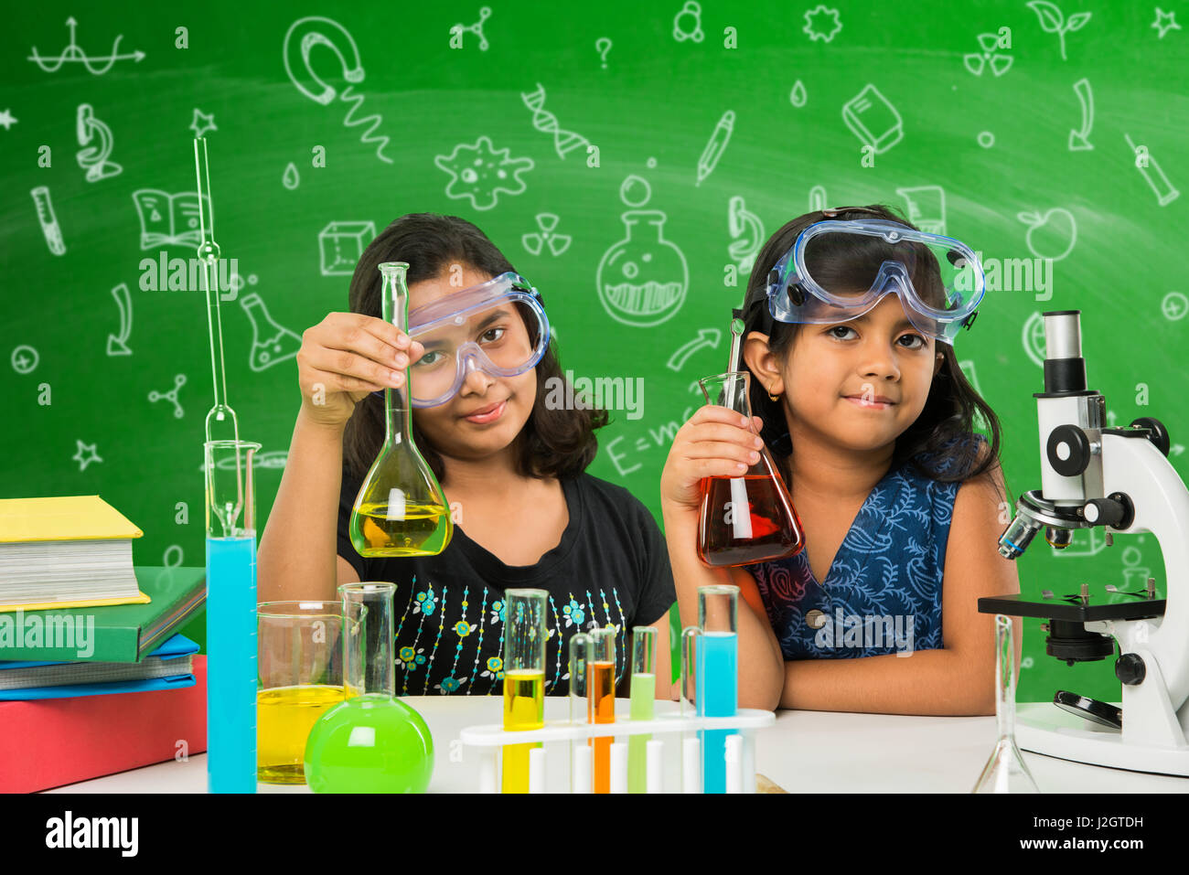 Indian kids doing science hi-res stock photography and images - Alamy