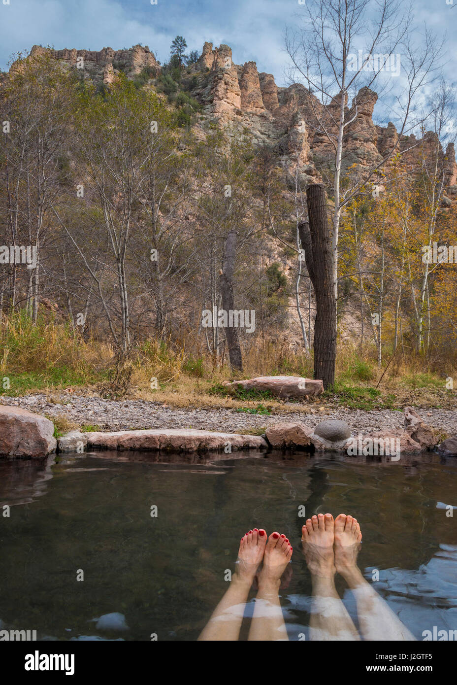 USA, New Mexico. Couple soaking in the Gila Hot Springs. Credit as: Don ...