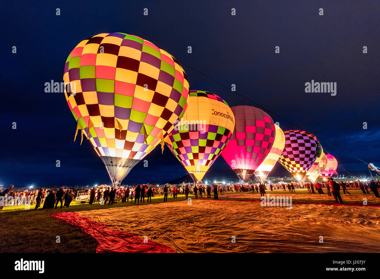Dawn balloon glow at The Albuquerque Balloon Fiesta in Albuquerque, New ...