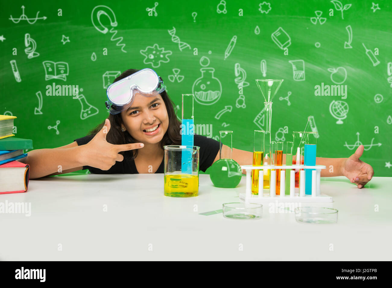 Indian kids doing science hi-res stock photography and images - Alamy