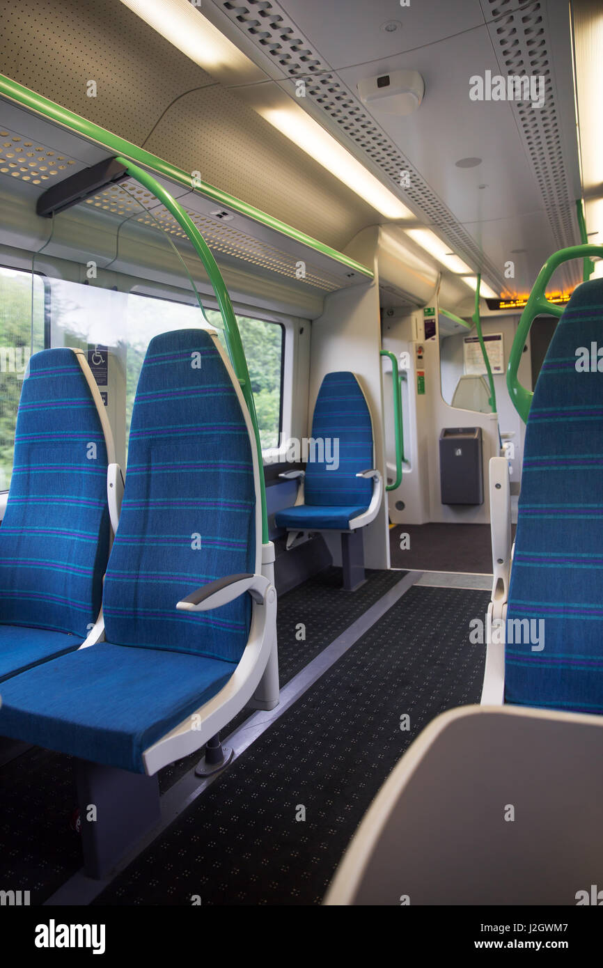 Electric train blue soft sits interior express Stock Photo - Alamy