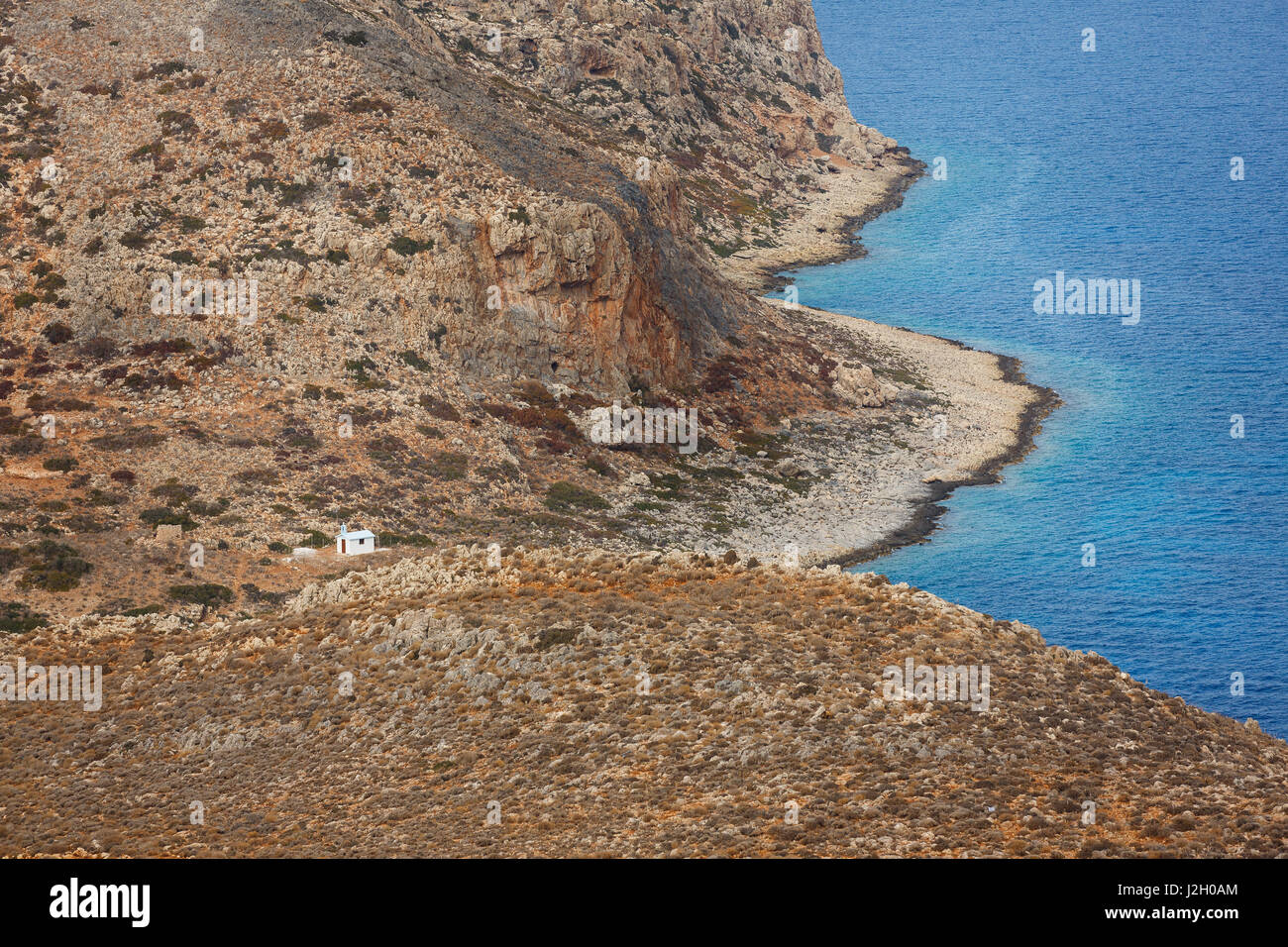 High rocky shore of the island of Crete Stock Photo - Alamy