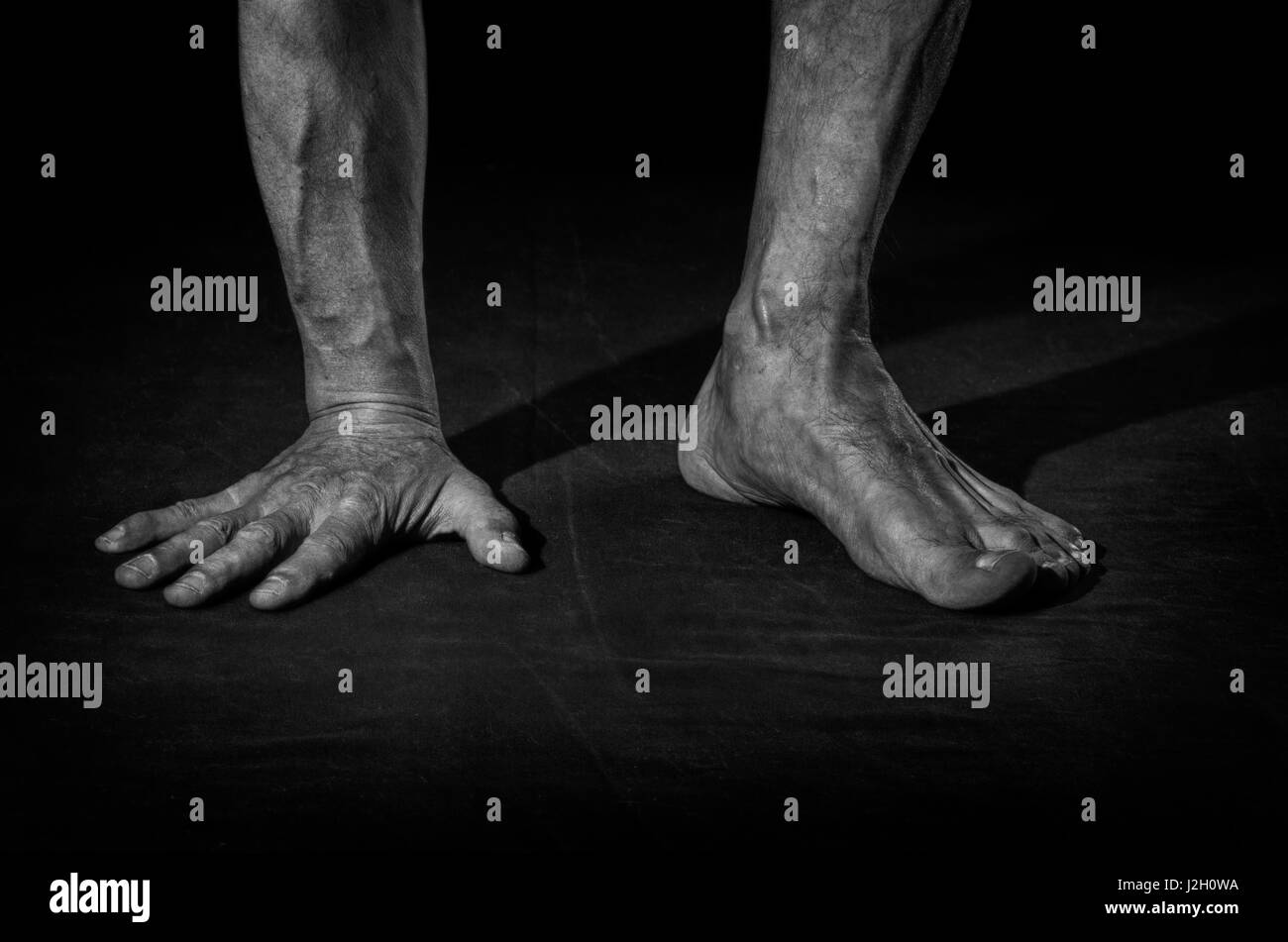 On one leg standing Black and White Stock Photos & Images - Alamy