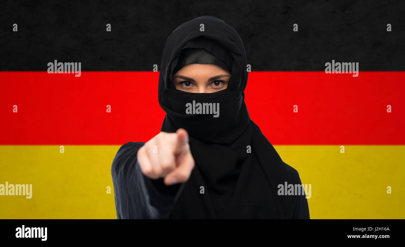 muslim woman in hijab pointing finger to you Stock Photo - Alamy
