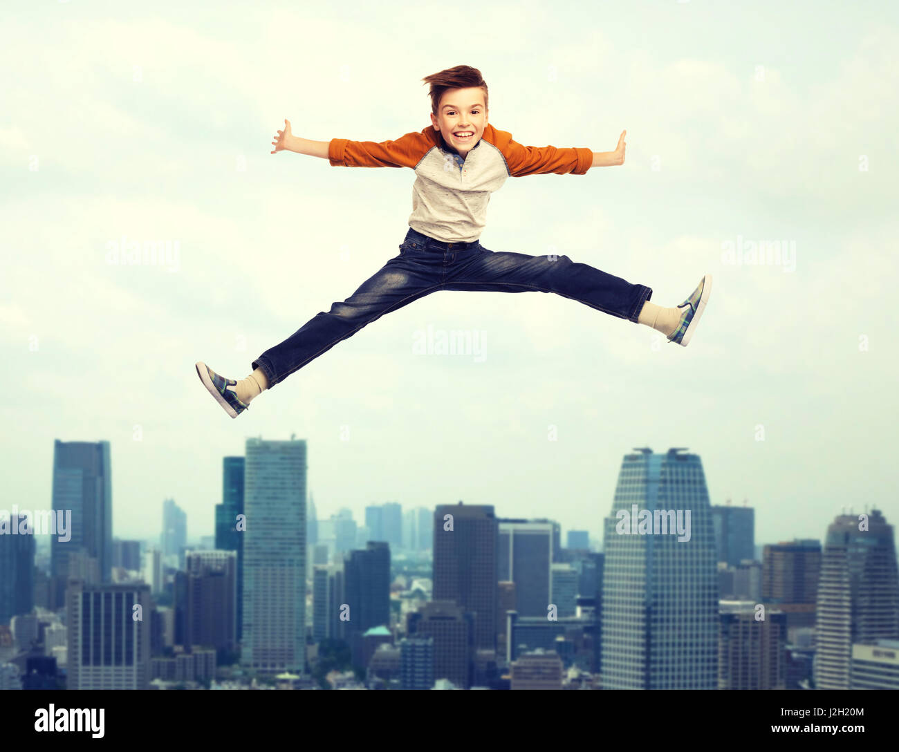 Happy jumping people in city hi-res stock photography and images - Alamy