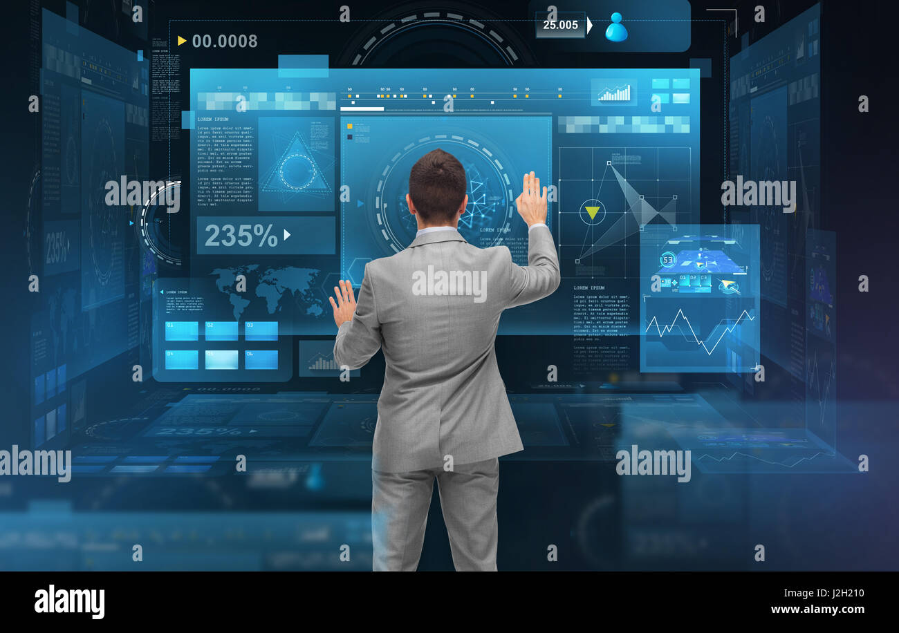 businessman working with virtual screens Stock Photo - Alamy