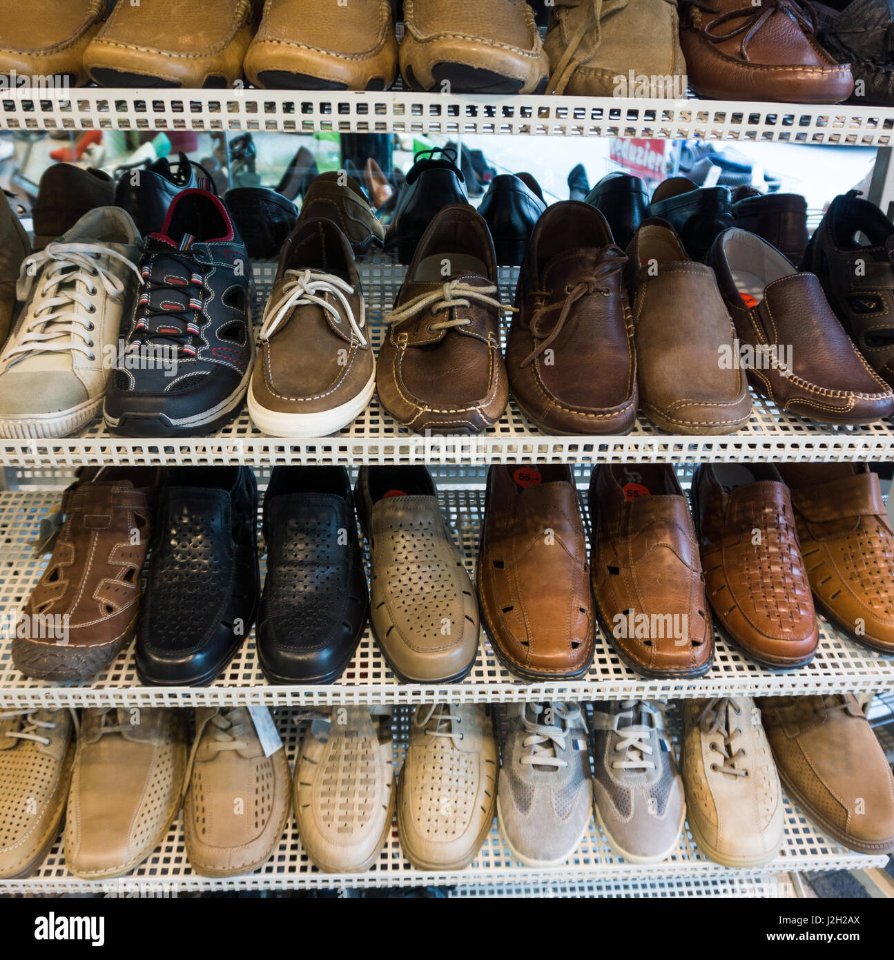 Lots of shoes hi-res stock photography and images - Alamy