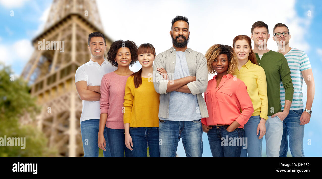 international group of people over eiffel tower Stock Photo - Alamy