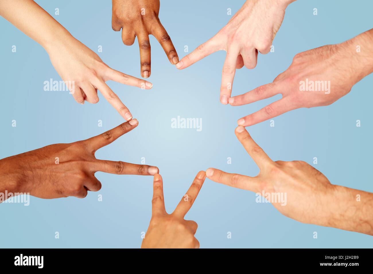 group of international people showing peace sign Stock Photo - Alamy