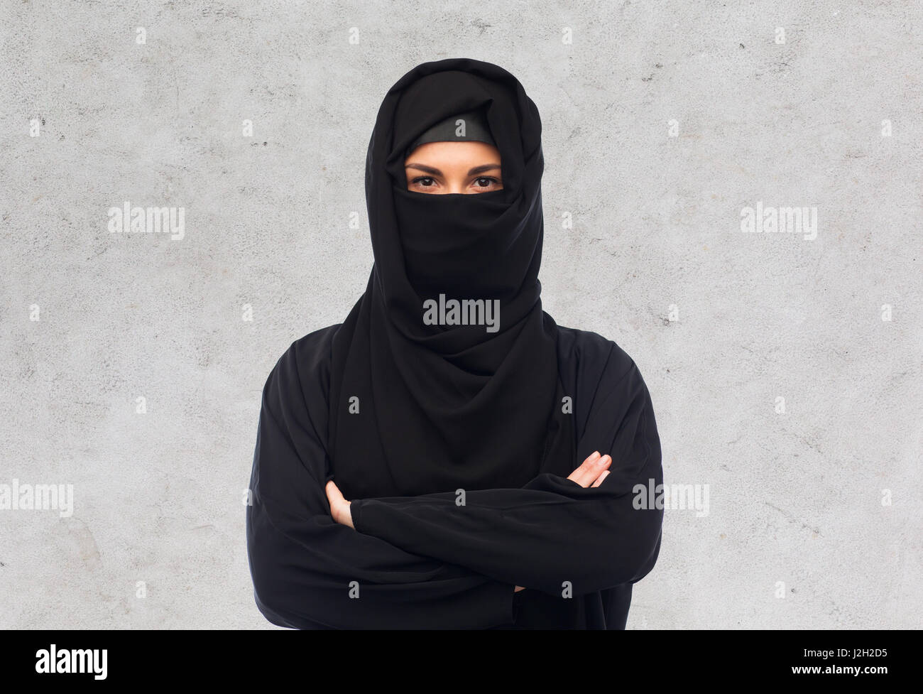 Woman in gray hijab hi-res stock photography and images - Alamy