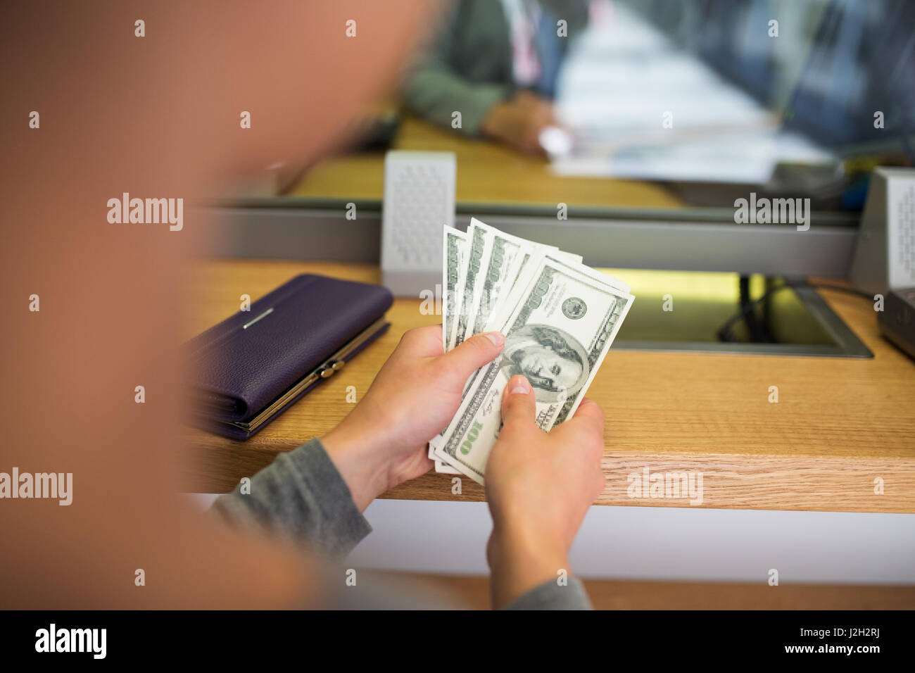 hands with money at bank or currency exchanger Stock Photo - Alamy