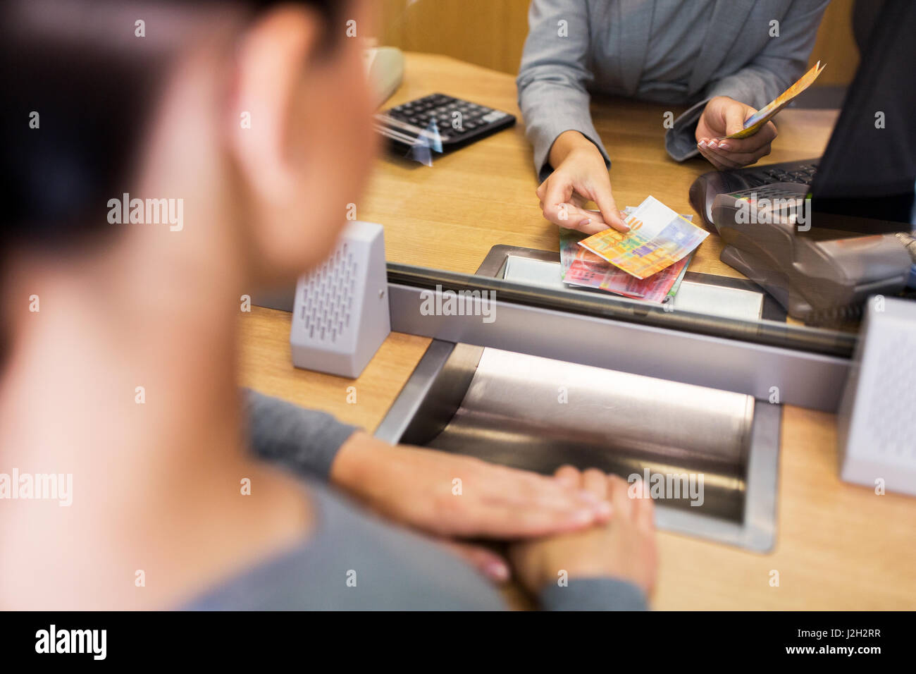 clerk counting cash money at bank office Stock Photo - Alamy