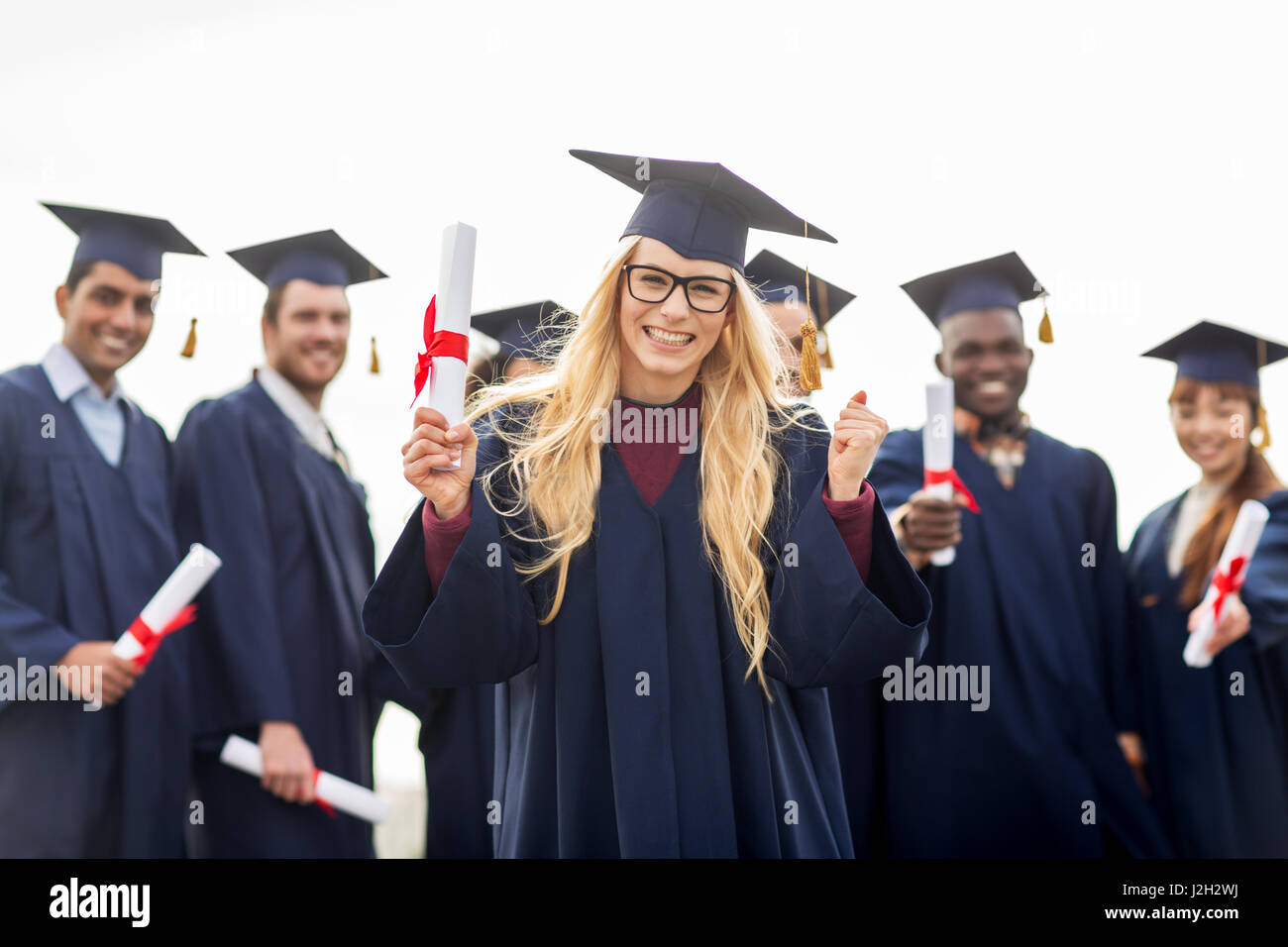 happy student with diploma celebrating graduation Stock Photo - Alamy