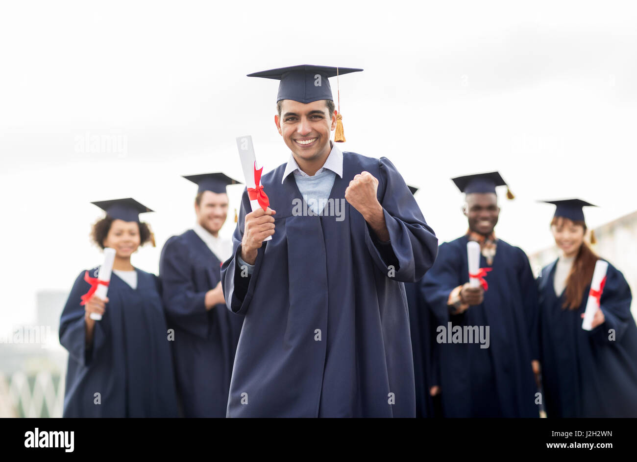 happy student with diploma celebrating graduation Stock Photo - Alamy
