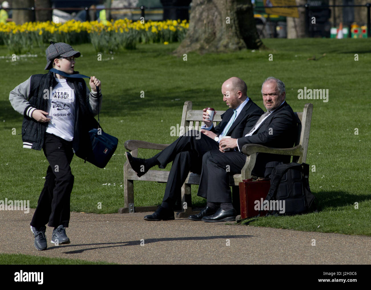 People enjoying the spring weather in St James Park, London. Featuring ...