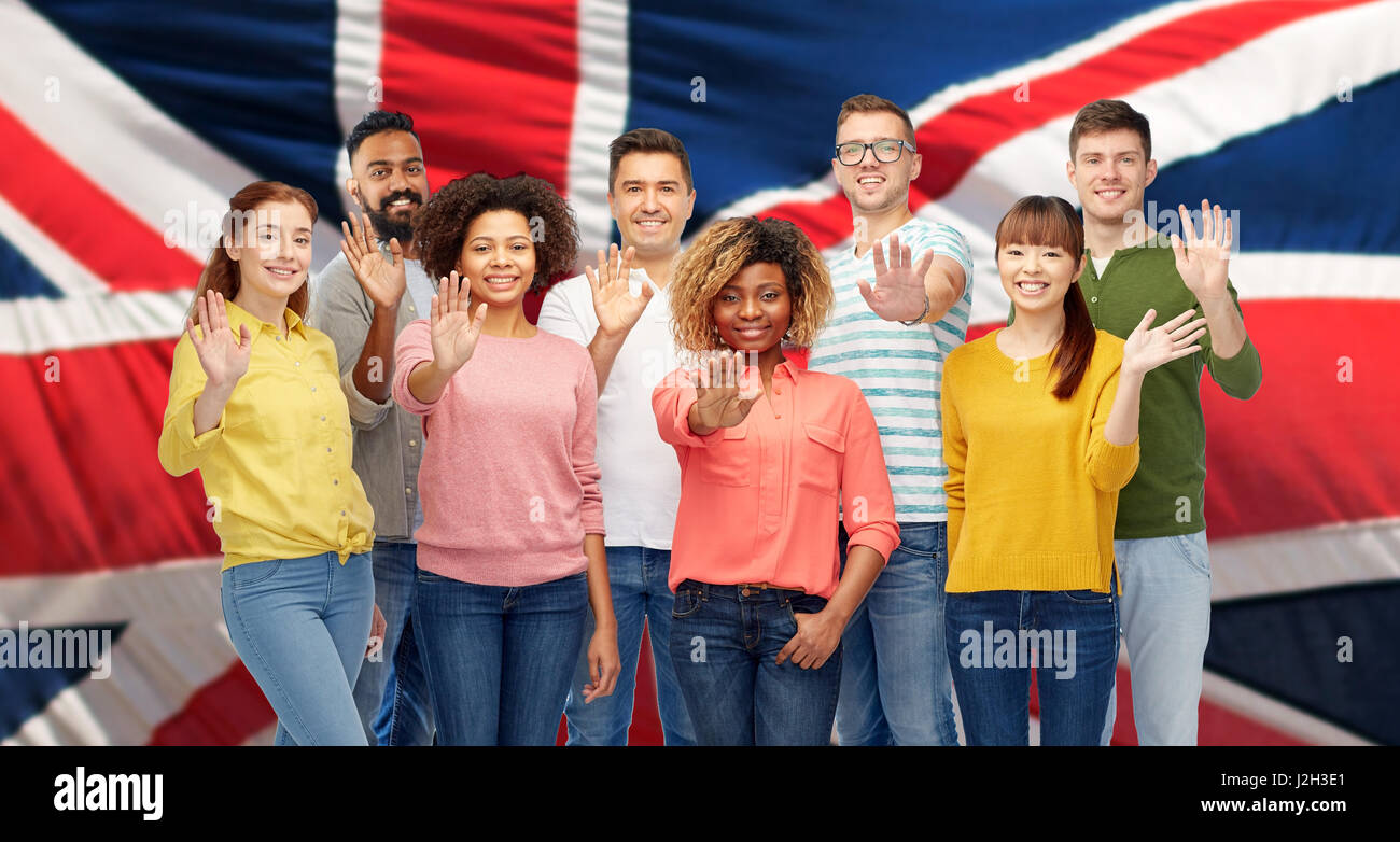 international group of happy people waving hand Stock Photo - Alamy