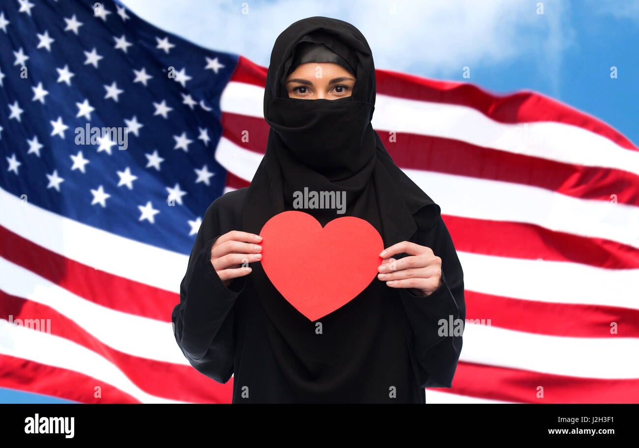 muslim woman in hijab holding red heart Stock Photo - Alamy