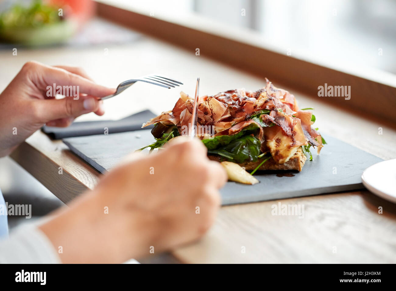 Ham eating woman hi-res stock photography and images - Alamy