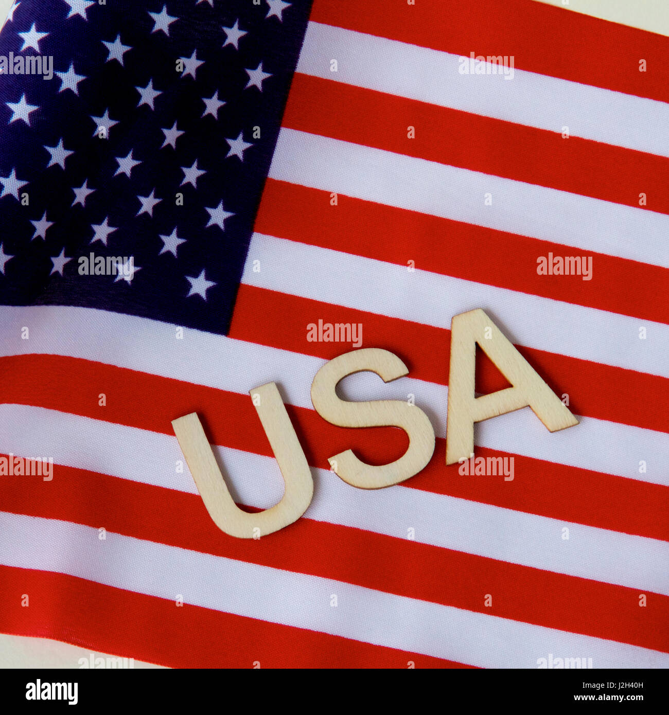 American flag with USA signage Stock Photo - Alamy