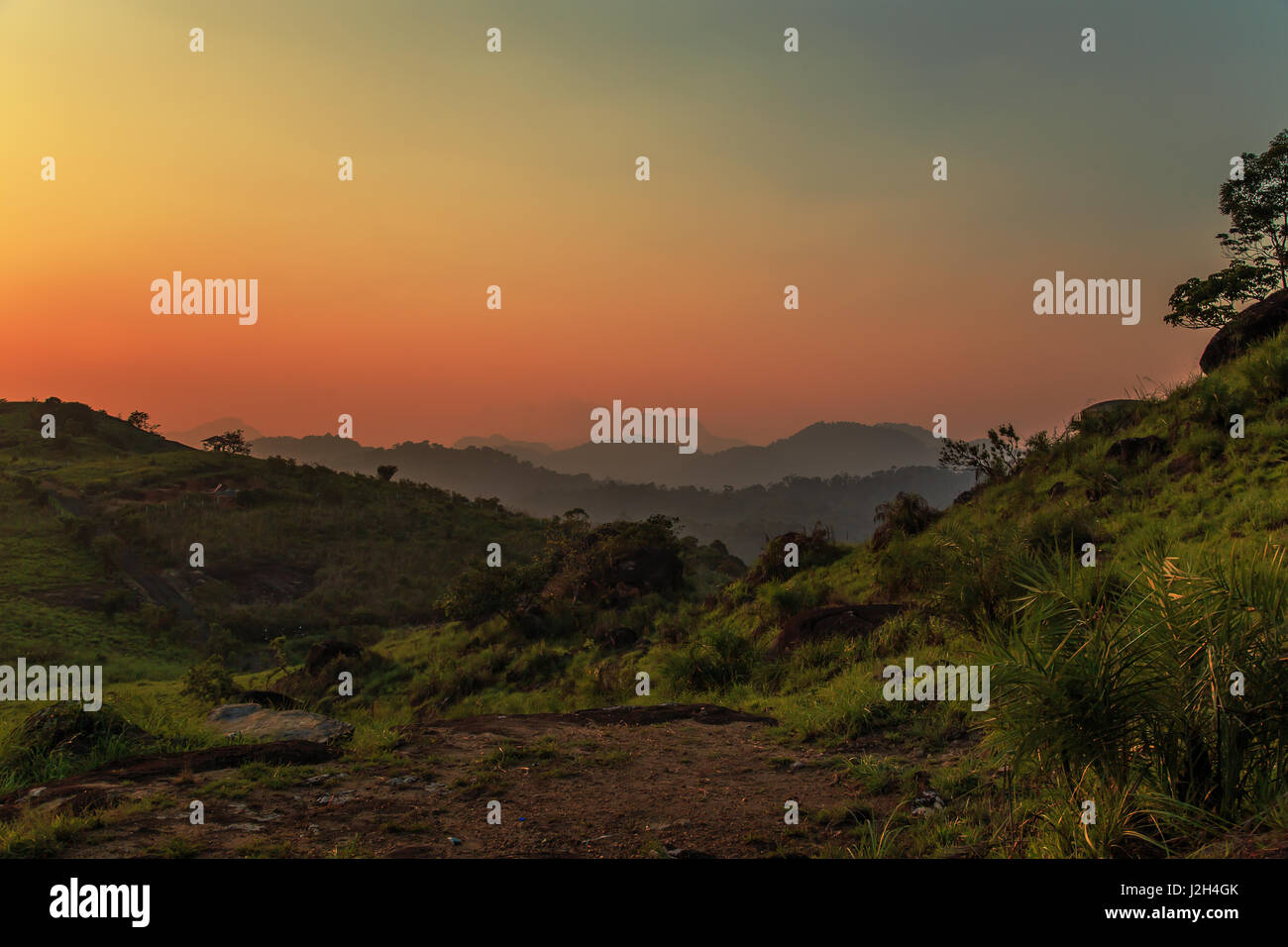 Beautiful sunset in the mountains. Munnar, Kerala state, South India ...